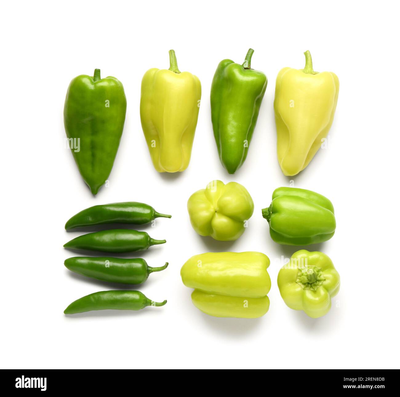 Different fresh peppers on white background Stock Photo - Alamy