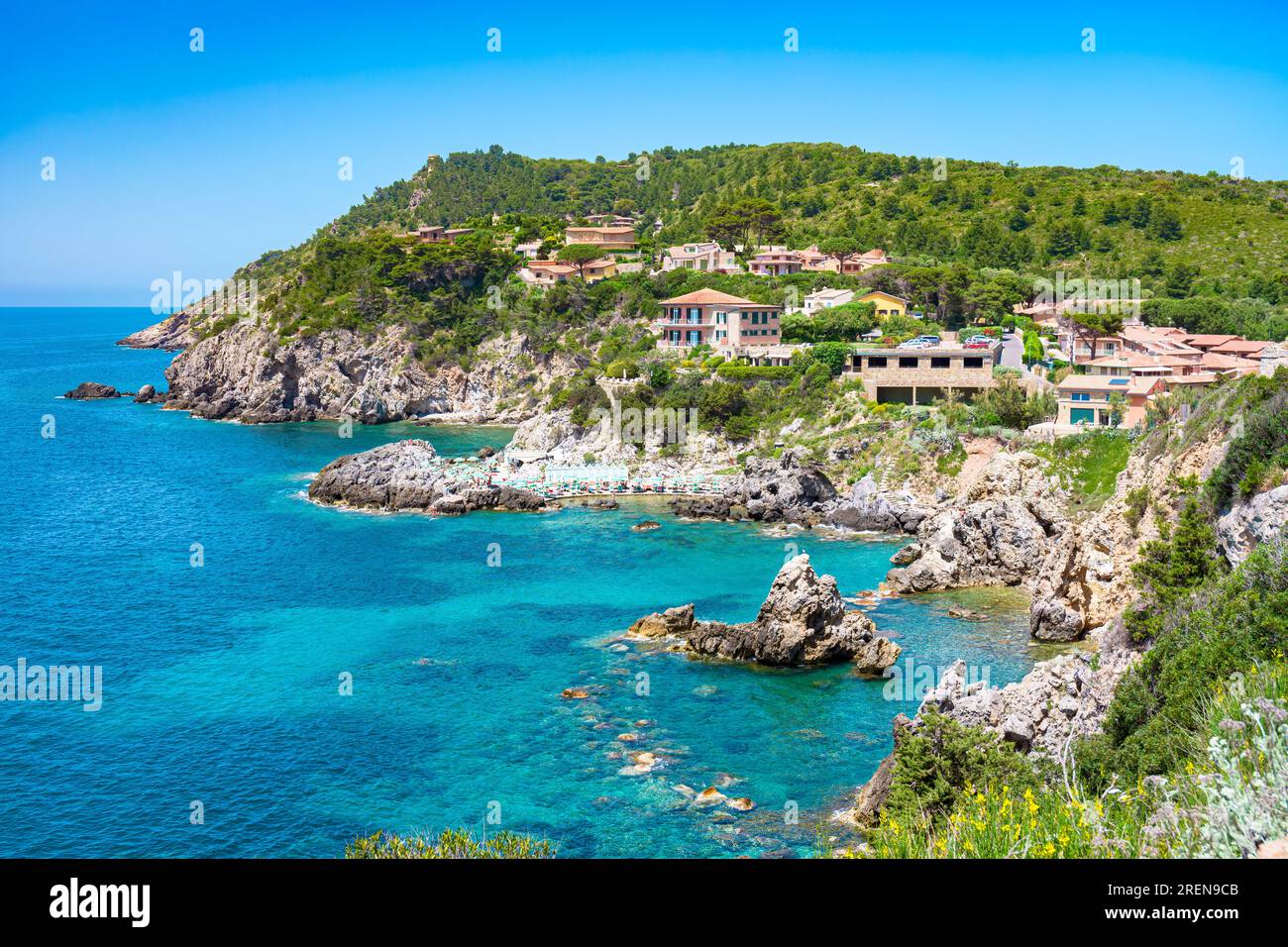 Talamone rocky beach, medieval fortress and walls, Argentario, Tuscany ...