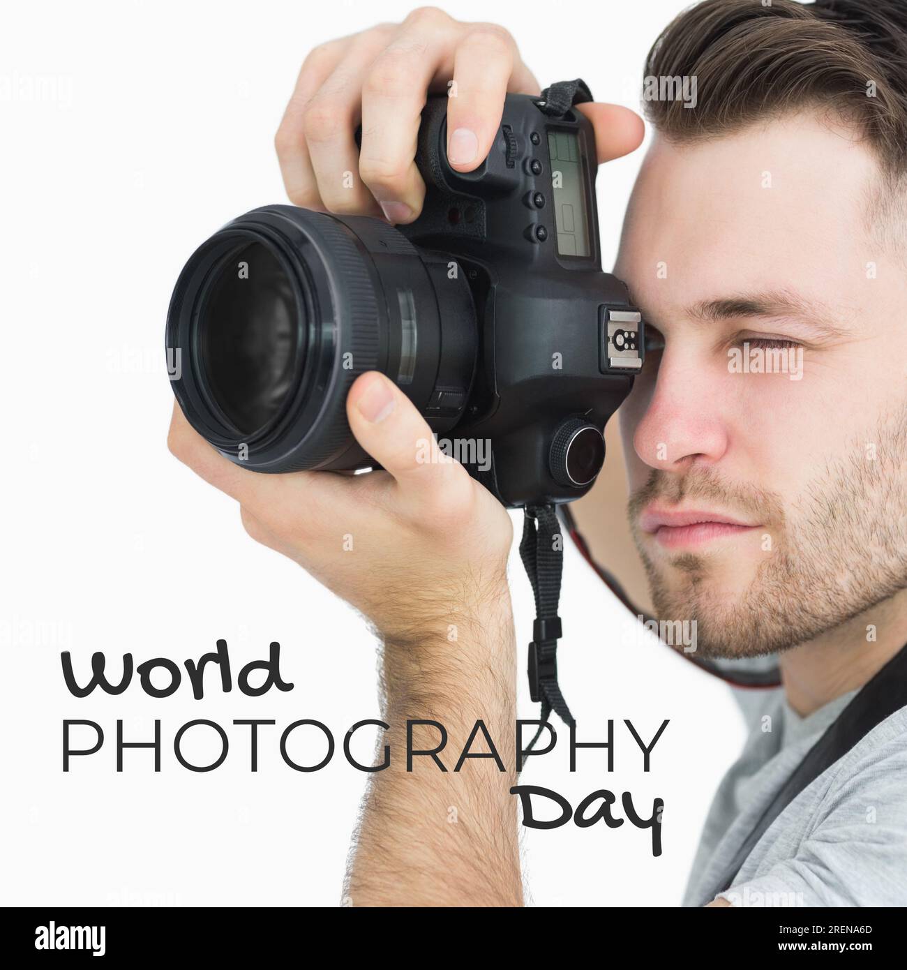 World photography day text in black over caucasian man using camera ...