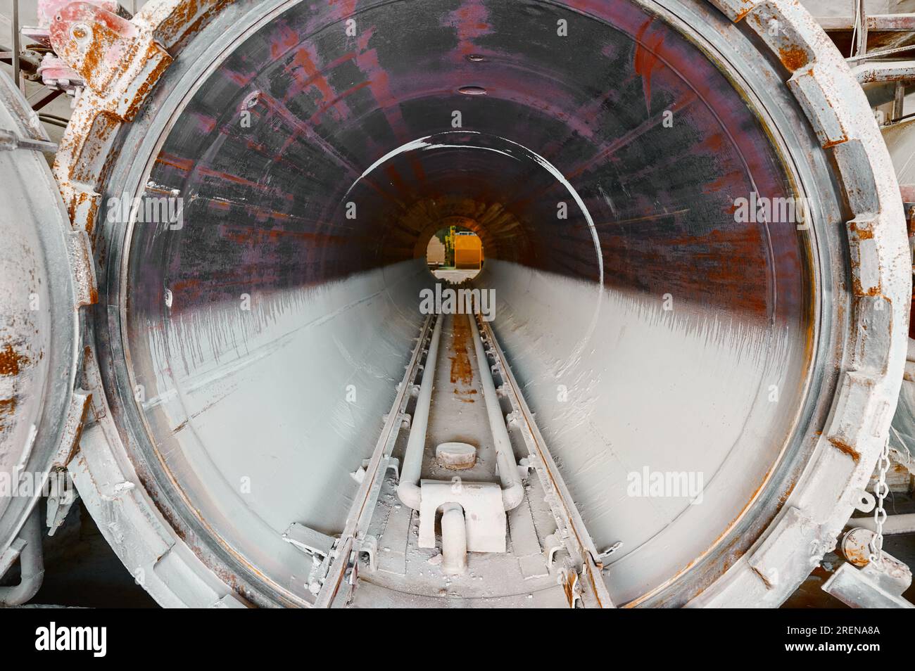 Open empty digestion tanks hardening in plant workshop Stock Photo - Alamy