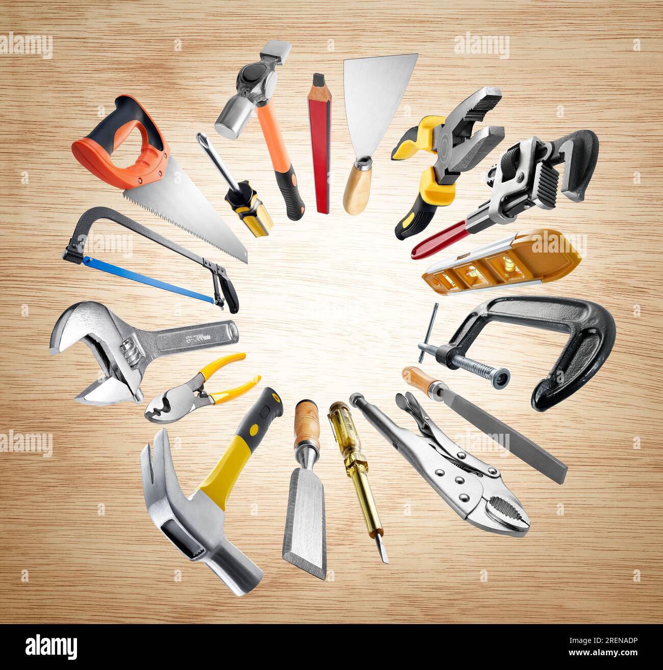 Work tools forming a circle on wooden background Stock Photo - Alamy