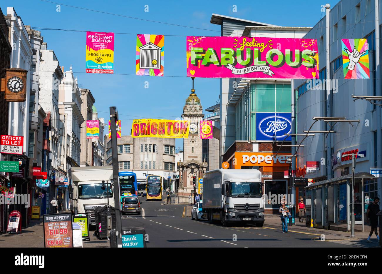 Colourful fabulous banner hanging across North Street in Brighton town ...