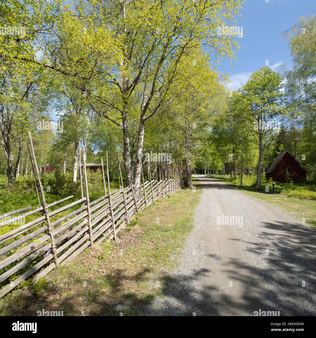 The pathway and passway are surrounded by an old traditional wooden ...