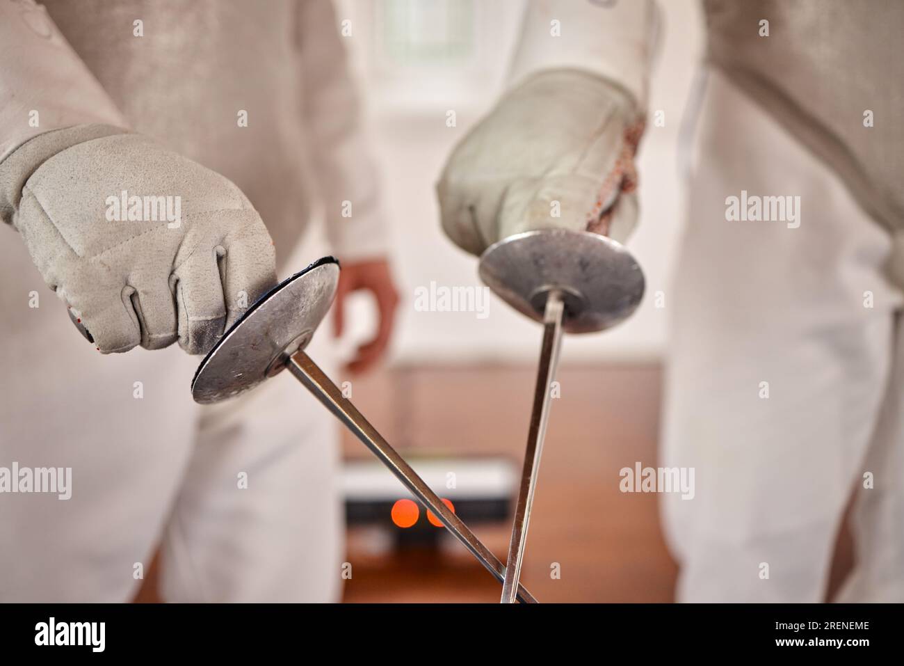 Fencing, hands or fight with a sword in training, exercise or fighting ...