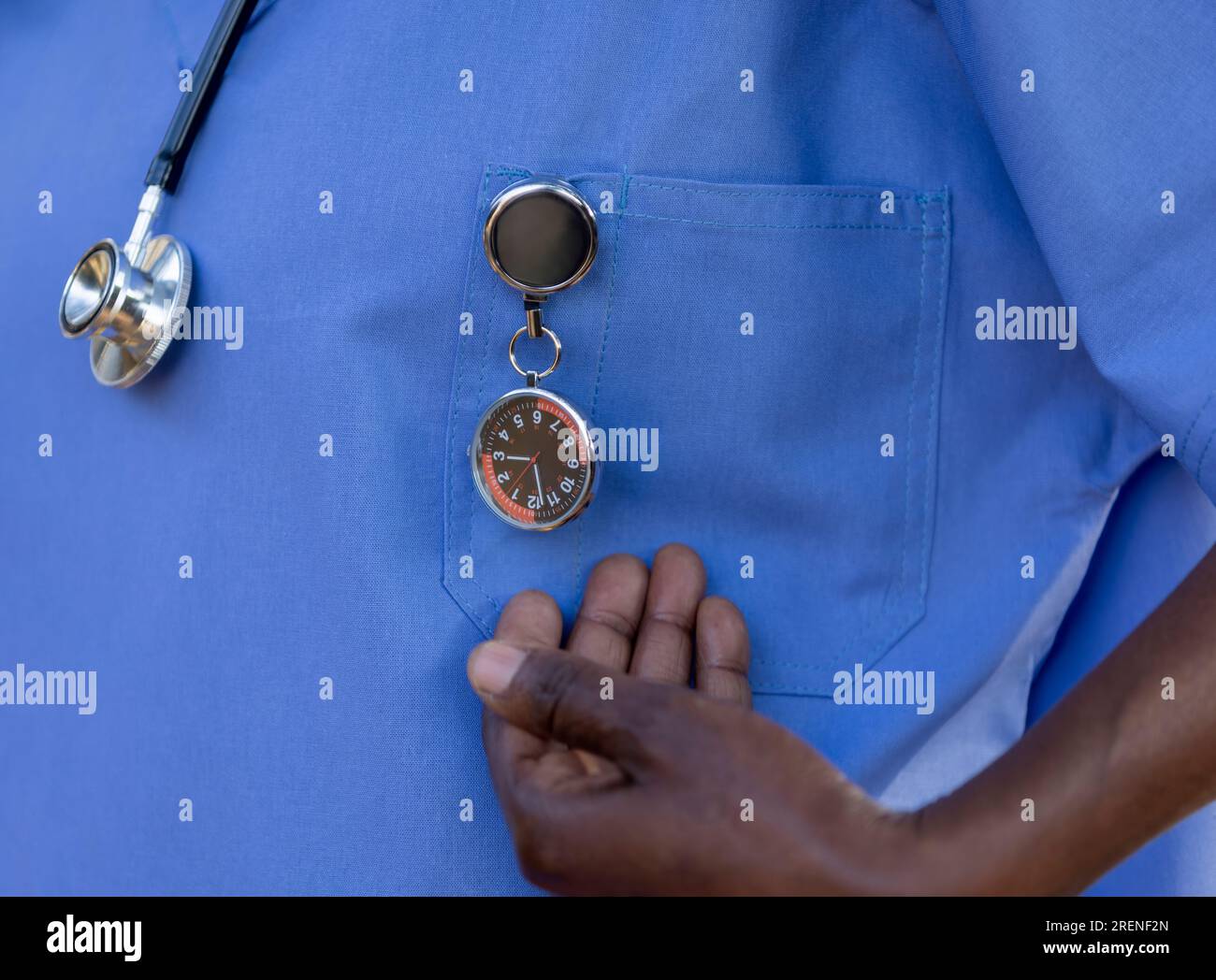 African nurse with a stethoscope and a specialized FOB watch, to keep ...