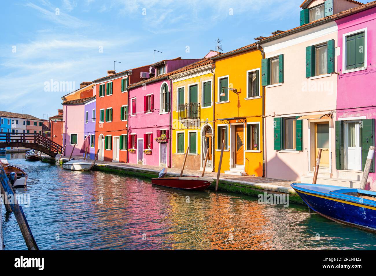 Colorful houses along the water canal in the island of Burano, Venice Stock Photo - Alamy