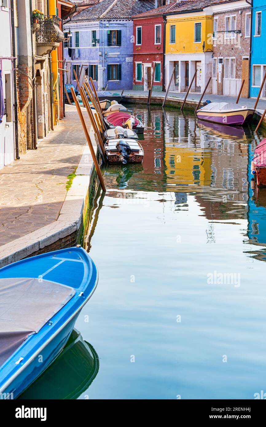 Colorful houses along the water canal in the island of Burano, Venice Stock Photo - Alamy