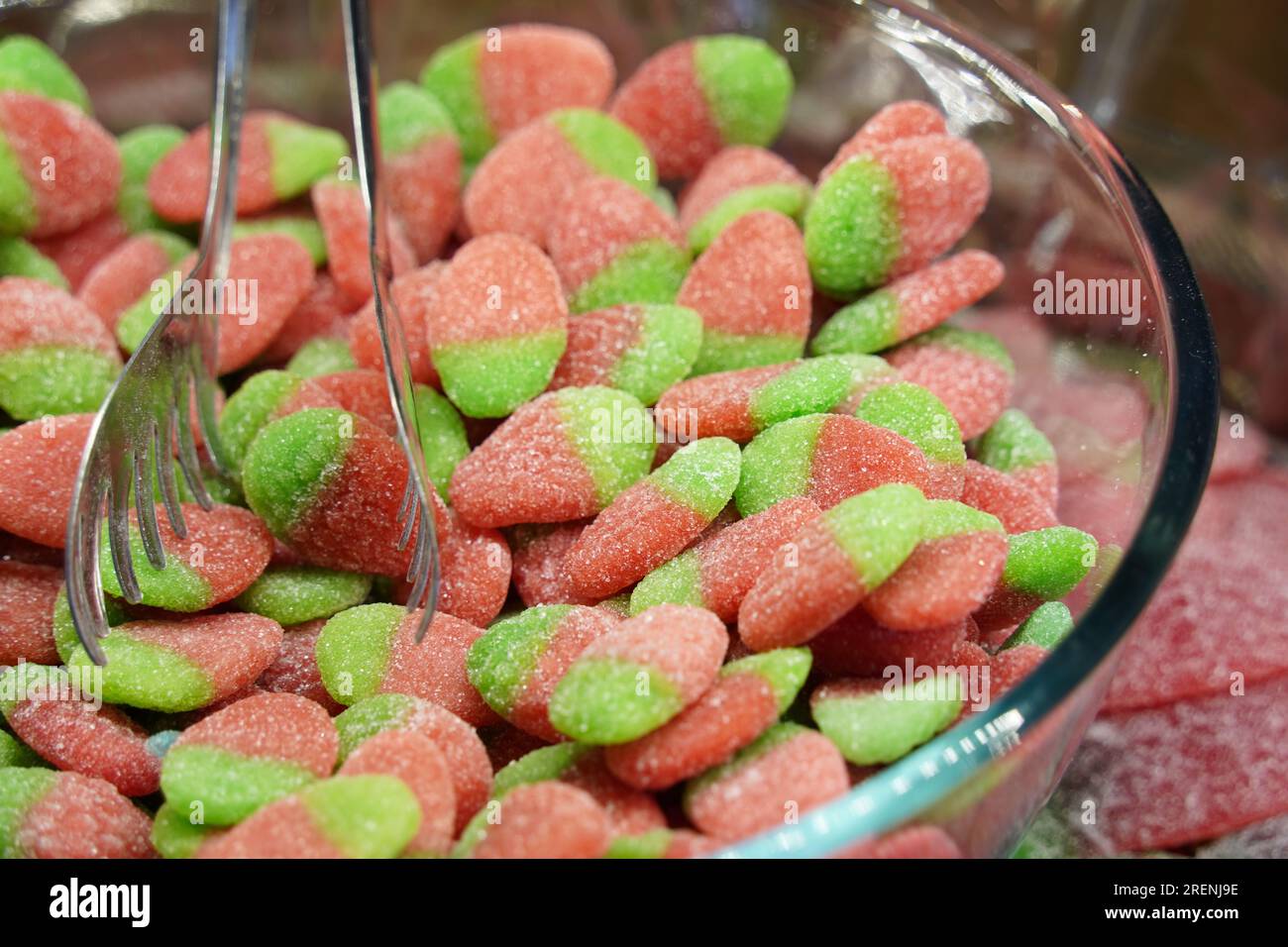 Oval pink-green sweets on the counter in the candy shop in Prague Stock ...