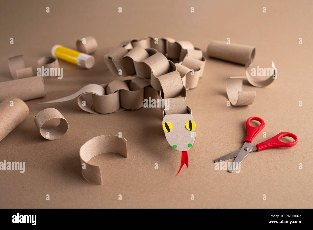 a snake made out of toilet paper rolls, craft made of recycle cardboard ...