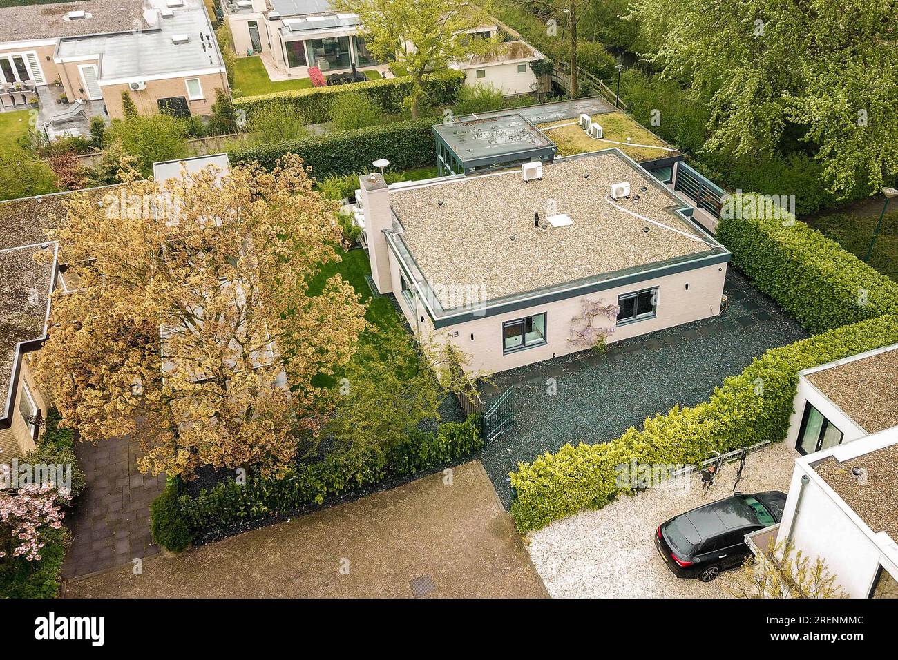 an aerial view of a house in the suburbs of vancouver, canada taken ...