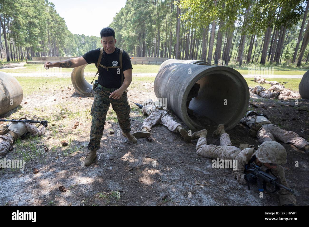 A U.S. Marine Corps tactical advisors trains a group of recruits during ...