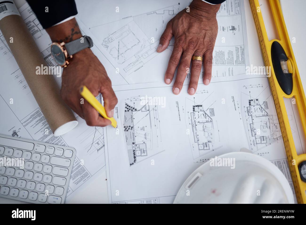 Top view of man, hands or engineering with blueprint, construction ...