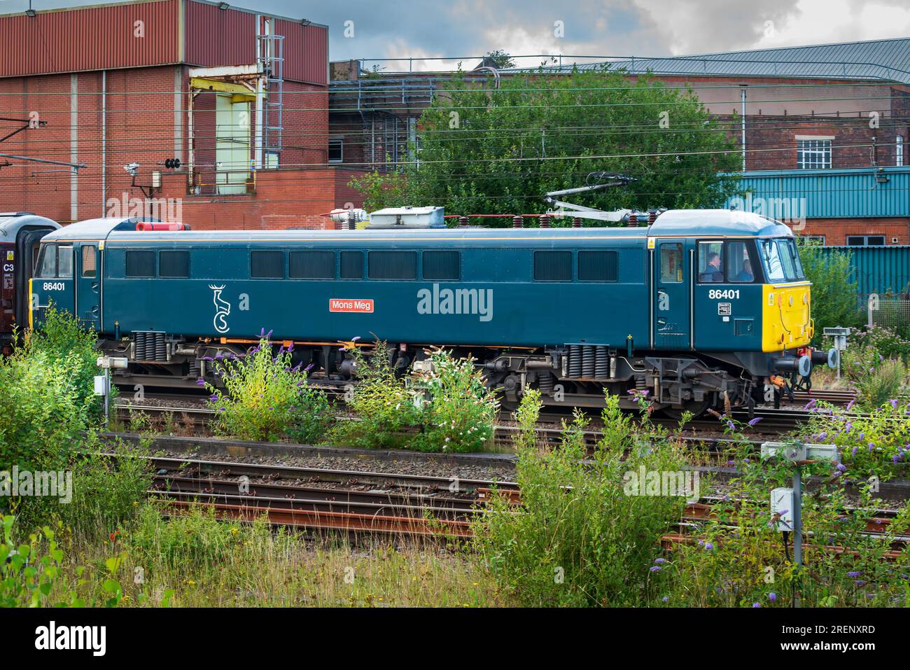 Caledonian Sleeper Class 86/4 Mons Meg number 86401 in Caledonin livery heads north through ...