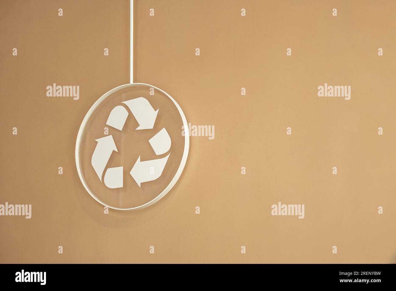 recycle sign logo on brown wall blank copy space for text modern design ...