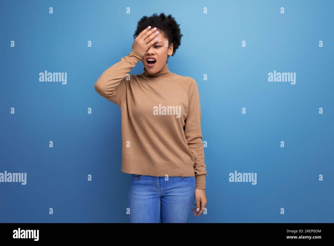 young attractive latin woman with black afro hair pulled back in ...
