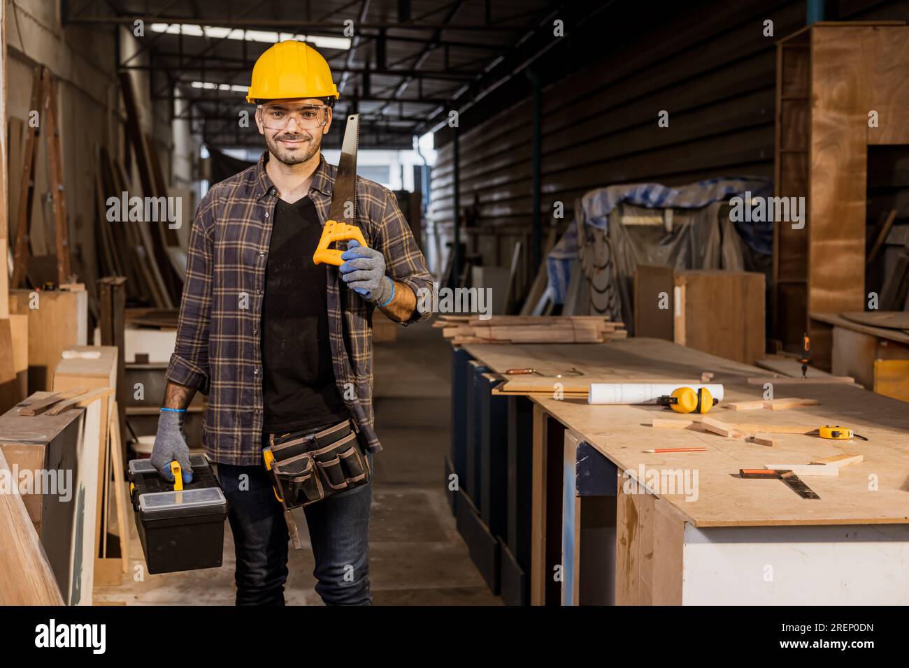 portrait hispanic indian male wood worker standing with tools happy ...