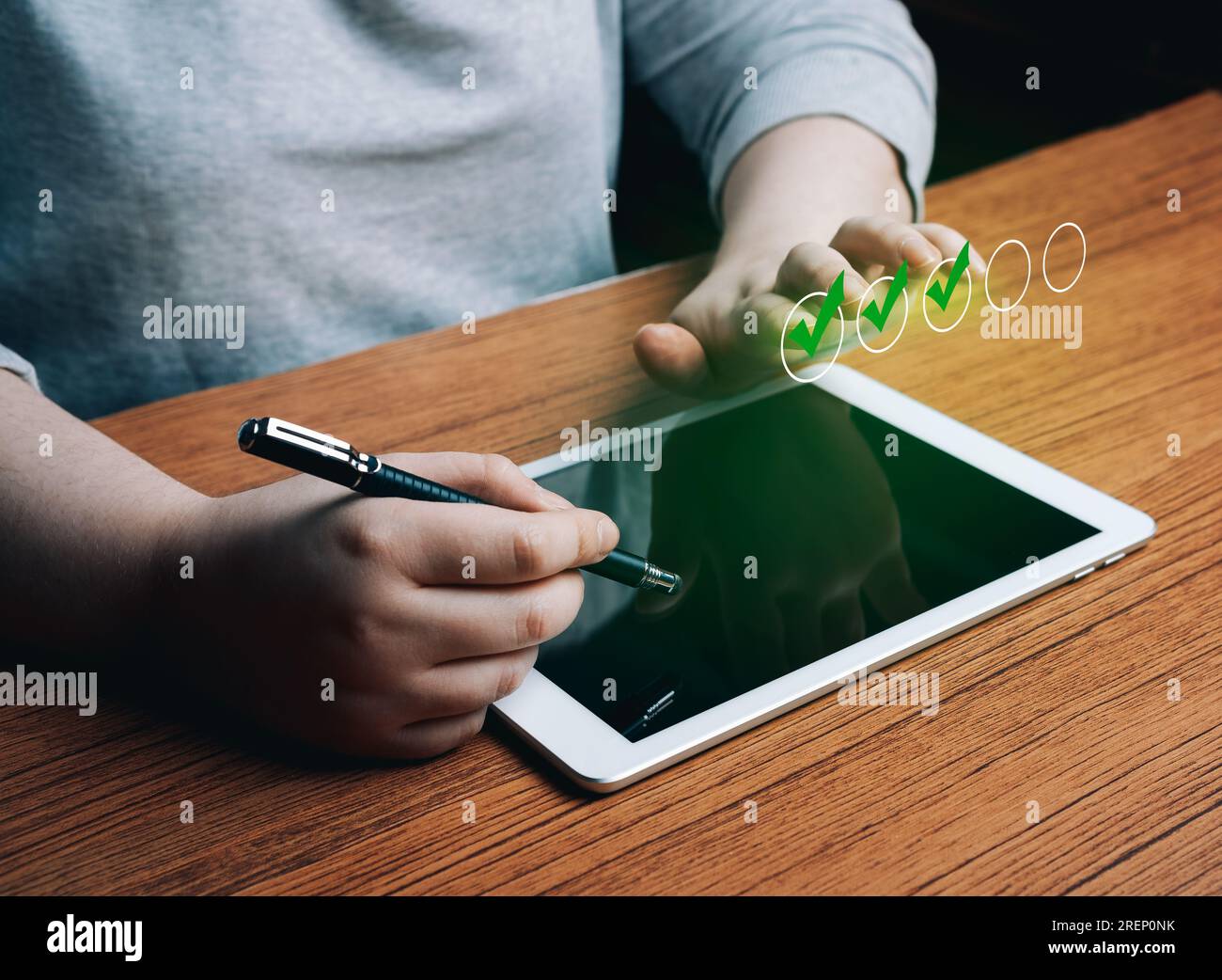 Woman use digital tablet marking check boxes. Successful completion of ...