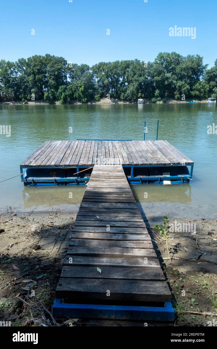 Wooden platform on the river Stock Photo - Alamy