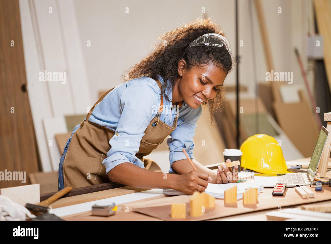 Carpenter Woman Woodworking In Workshop Designer Building Wood Home. Architect Women Smart Work ...