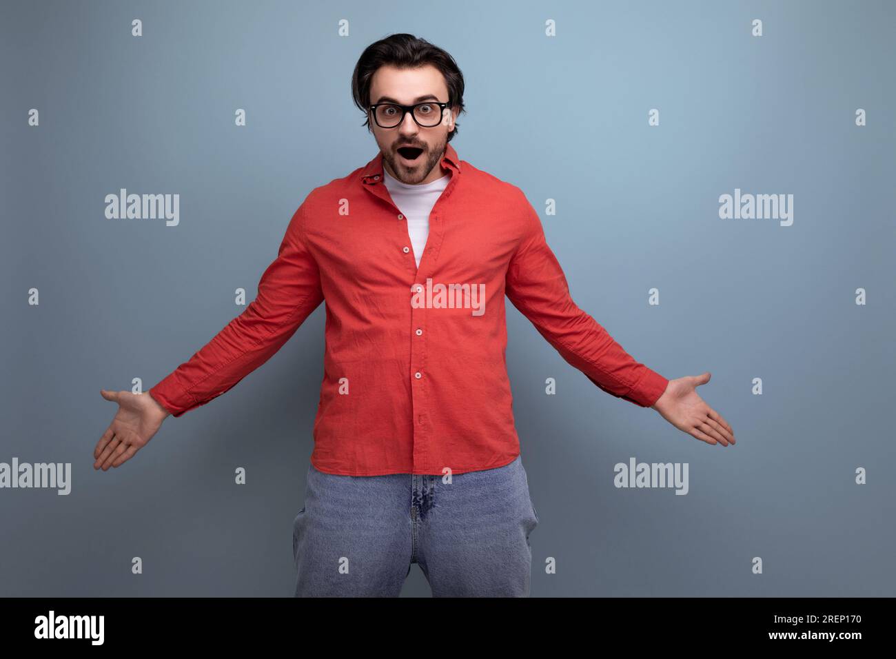 Young man throws arms up hi-res stock photography and images - Alamy