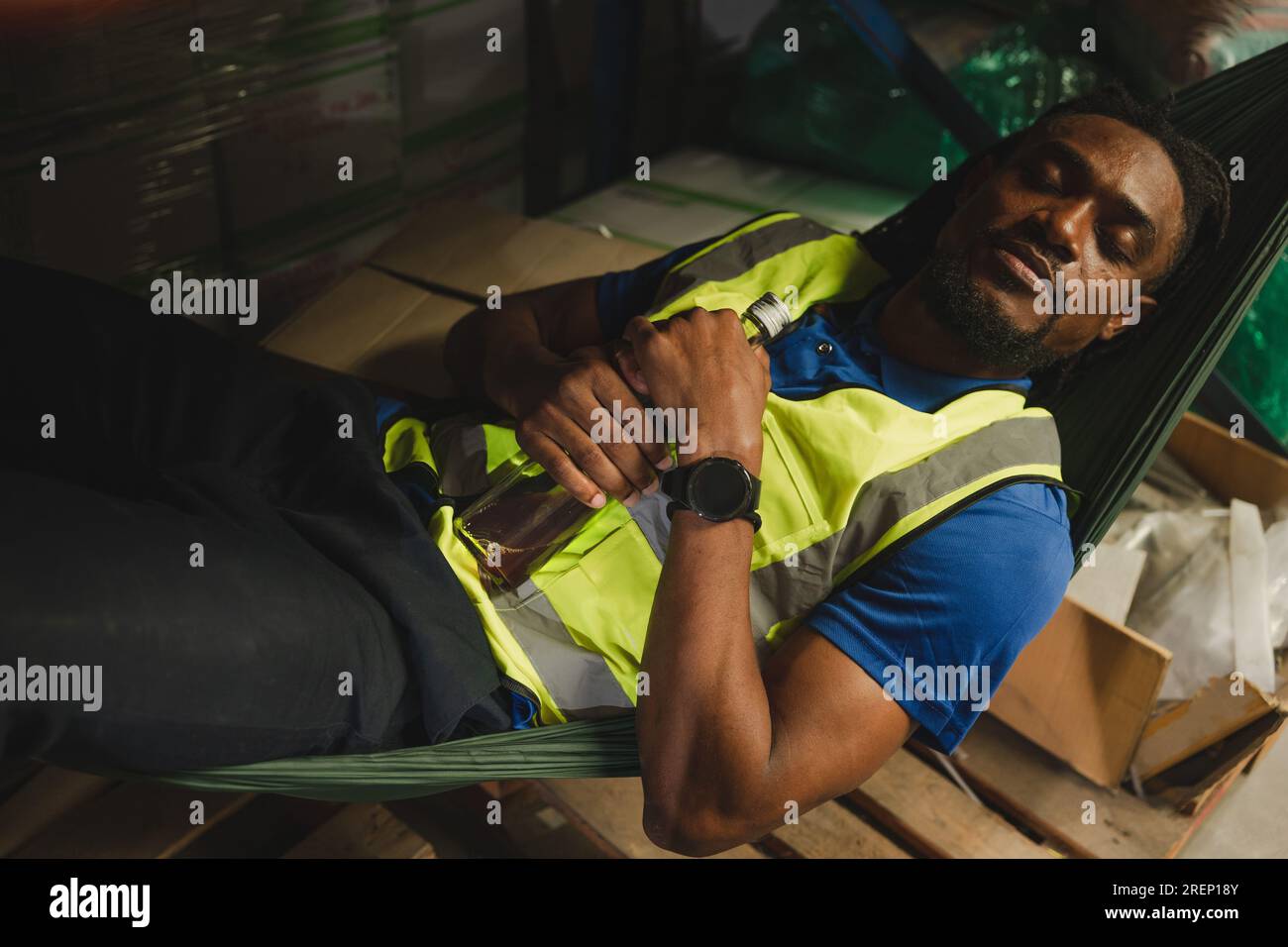 Lazy alcoholic worker male sleep during work hours Stock Photo - Alamy