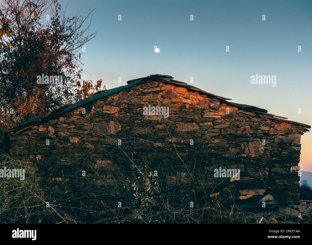 A traditional stone hut, locally known as a Channi, set against the ...