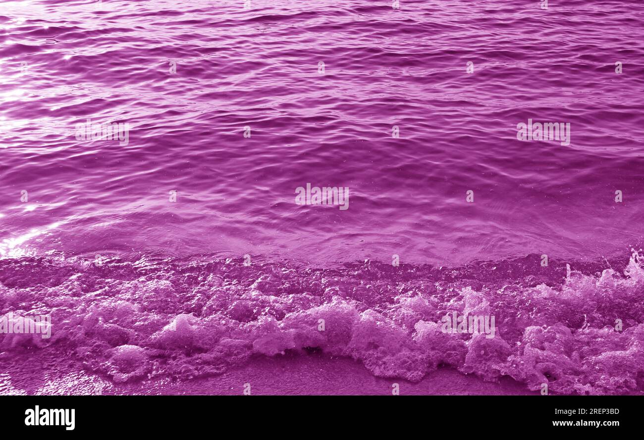 Pop art surreal style of purple colored waves splashing on the beach ...