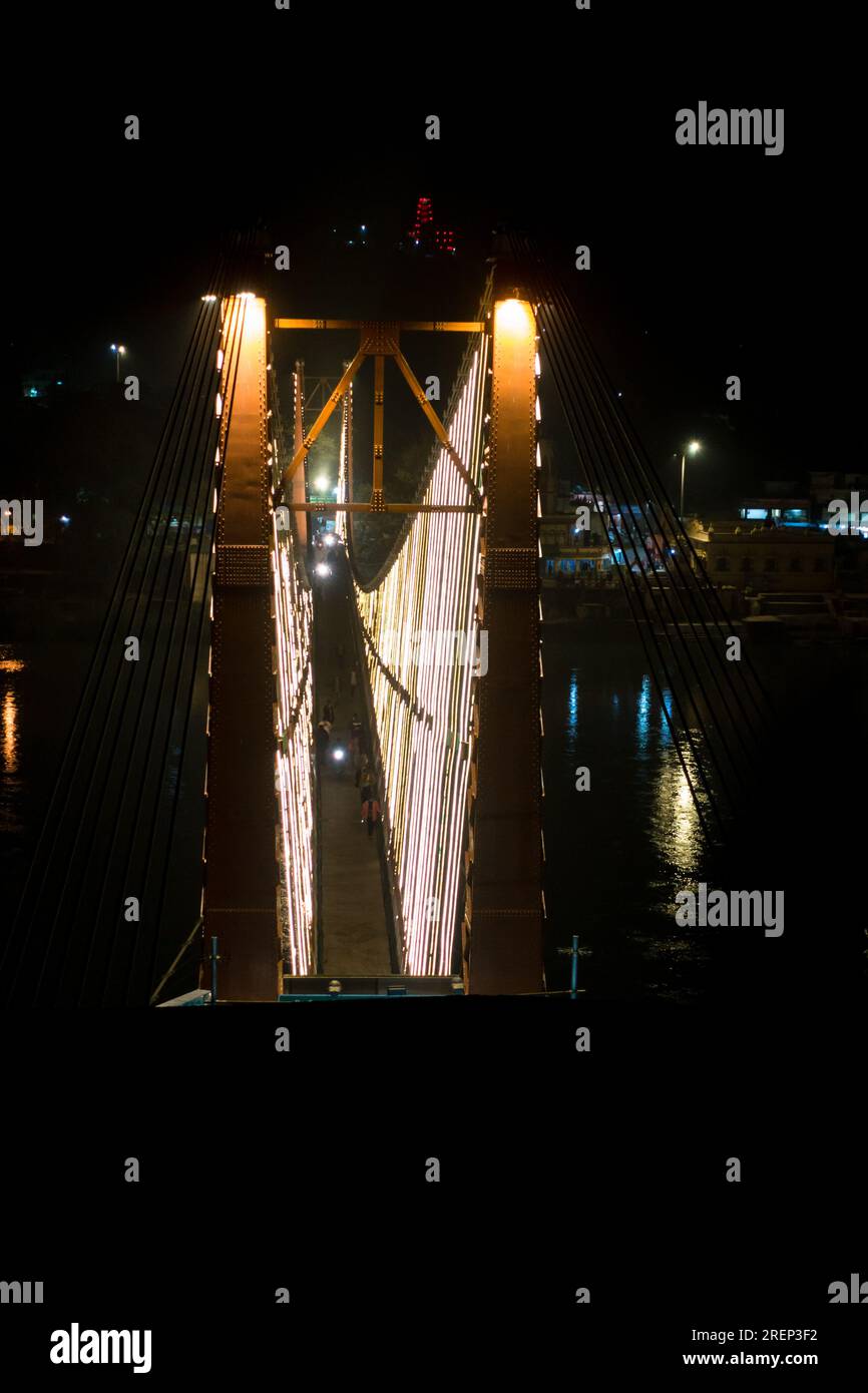 Lakshman Jhula, the ancient hanging bridge, beautifully lit with lights ...