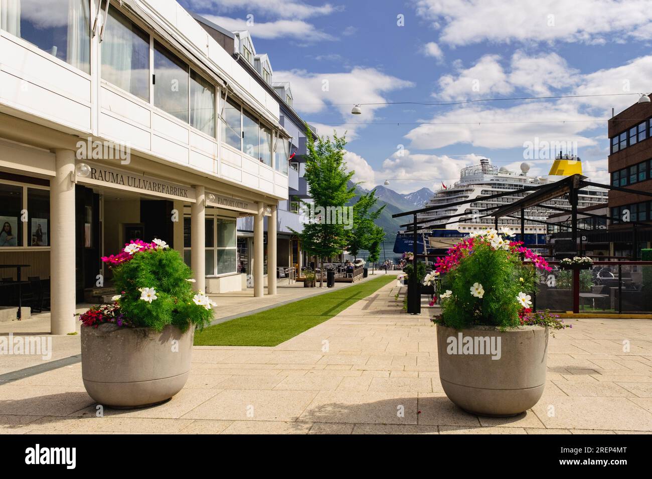 Street scene in the town centre with a cruise ship in port. Andalsnes ...