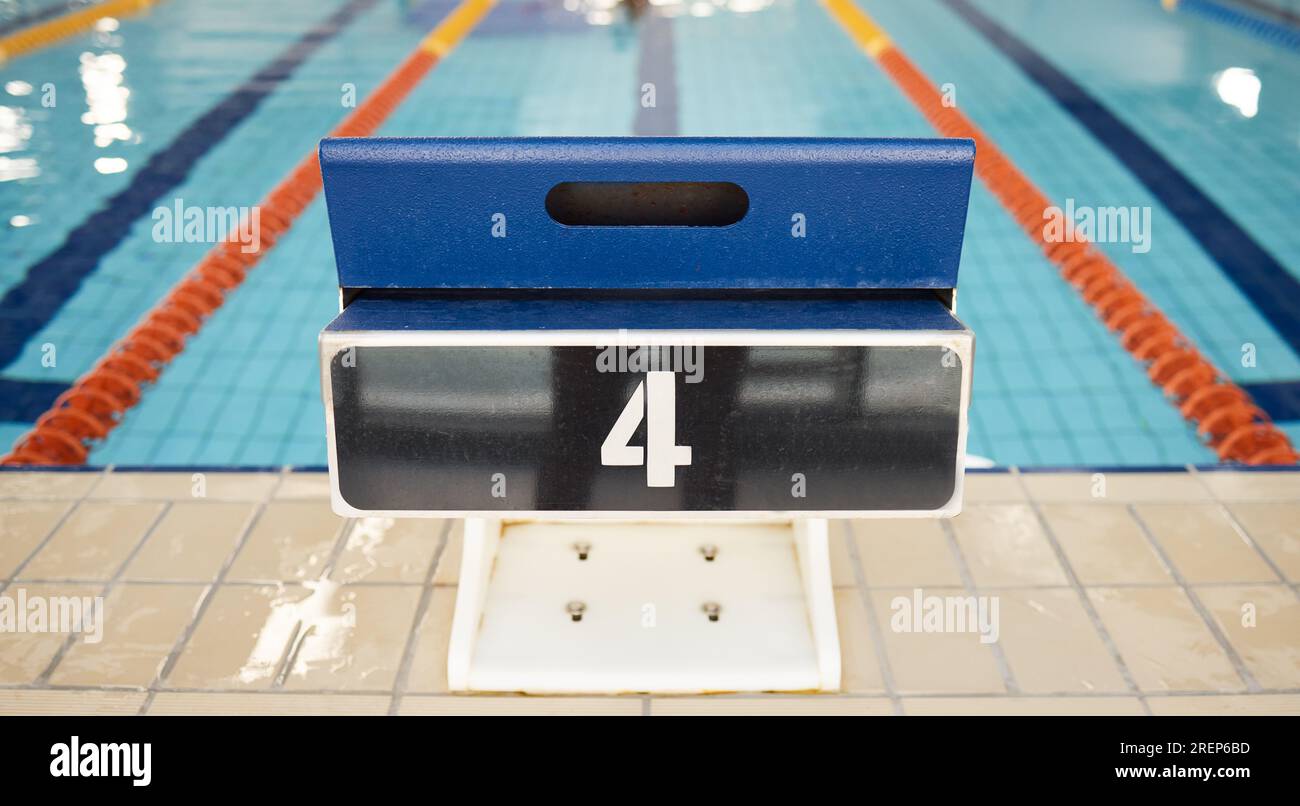 Empty swimming pool, platform and start competition of water sports ...