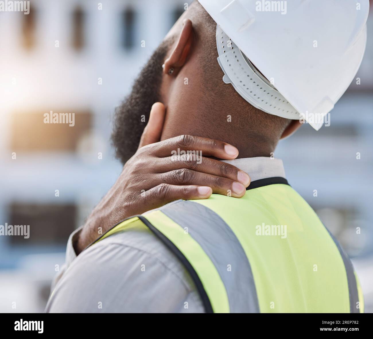 Engineer, outdoor and man with neck pain, injury and stress with ...