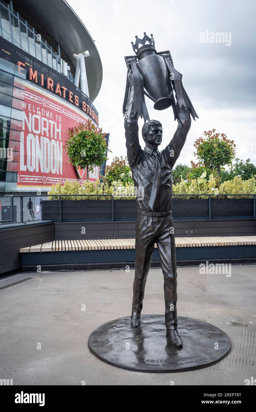 London, UK. 29 July 2023. A general view of the statue of Arsenal manager Arsène Wenger holding ...