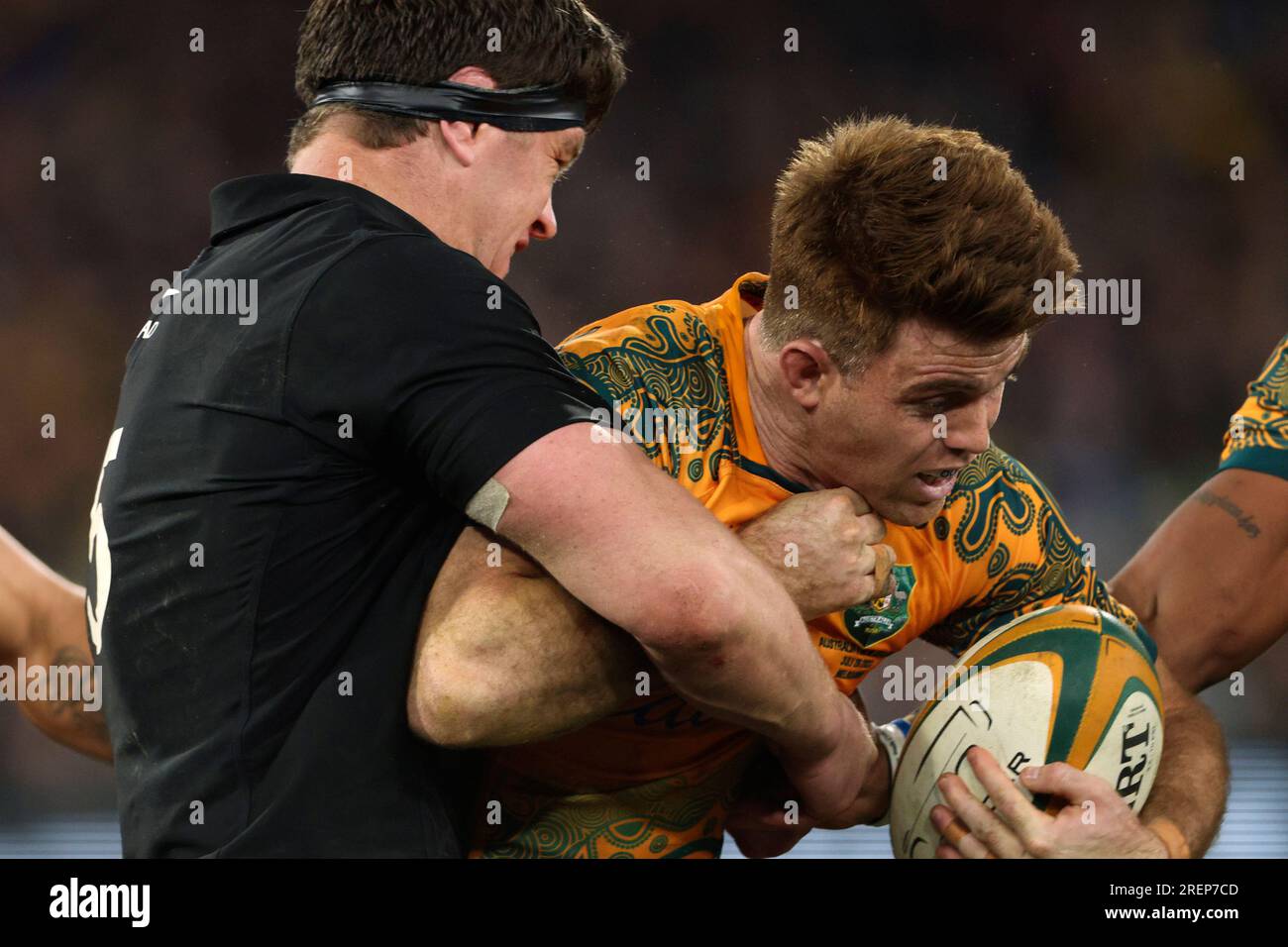 Australia's Andrew Kellaway, right, is tackled by New Zealand's Scott ...