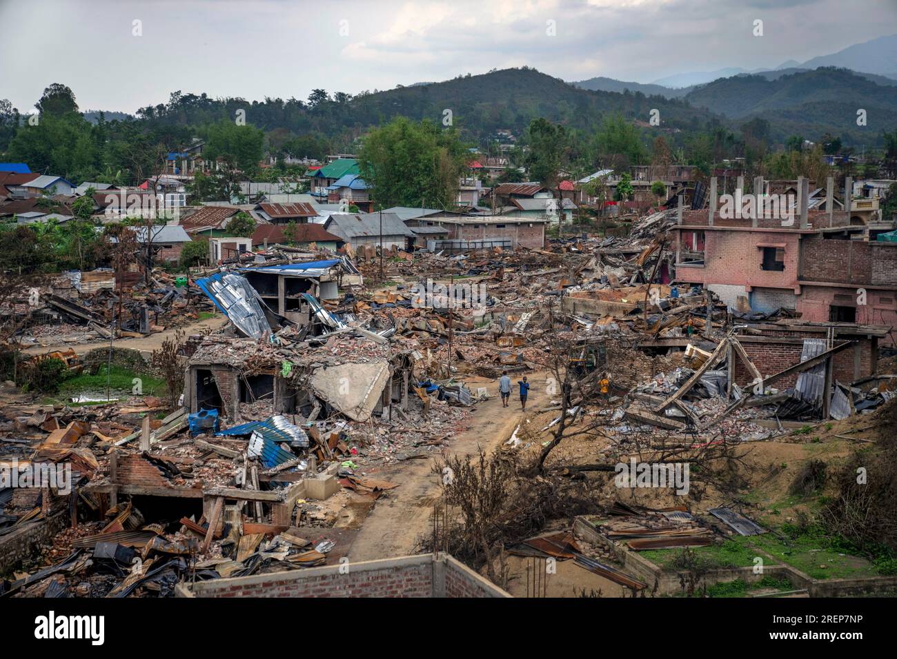 Dozens of houses lay vandalised and burnt during ethnic clashes and ...