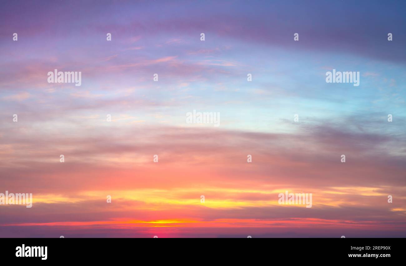 Gentle ligth colors of sunrise sundown sky with pastel light clouds ...