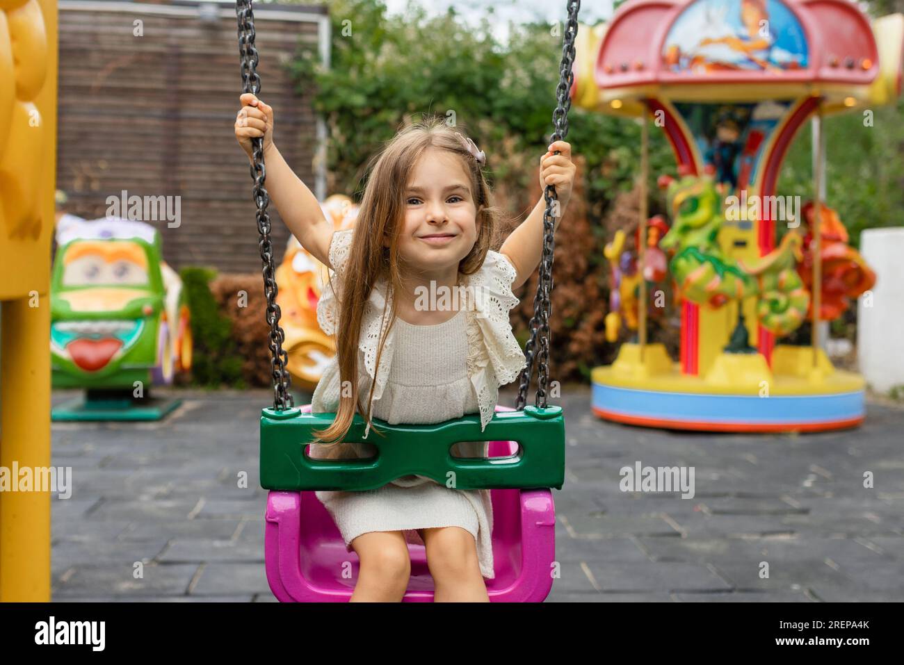 Girl having fun on seesaw hi-res stock photography and images - Alamy