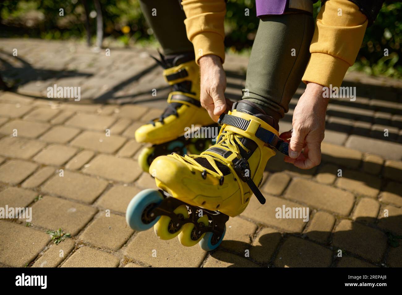 Active man on roller skates hi-res stock photography and images - Alamy