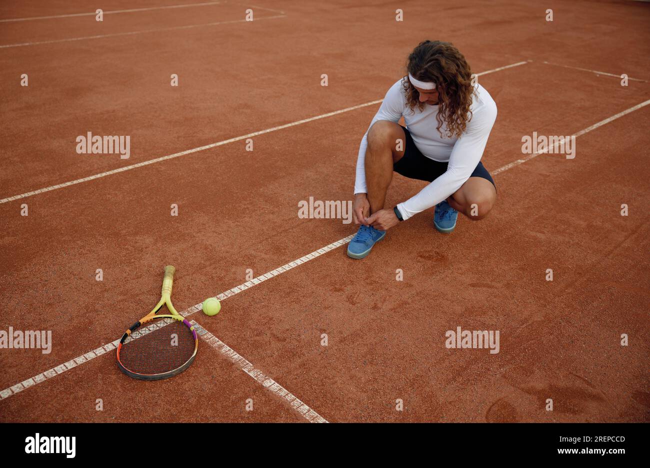 Male tennis player sitting hi-res stock photography and images - Alamy