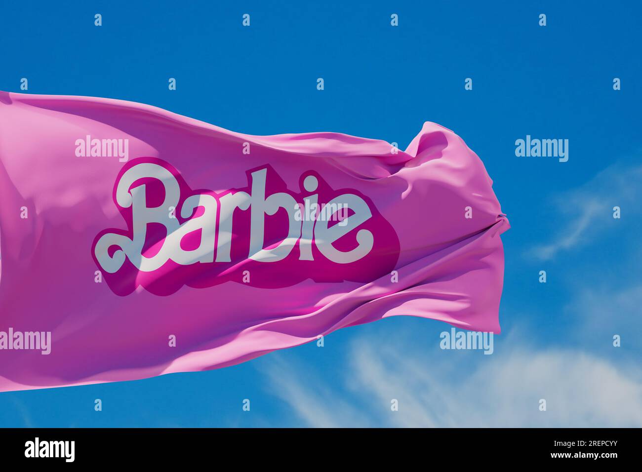 LONDON, UK - July 2023: Barbie doll logo on a flag. Barbie is a fashion ...
