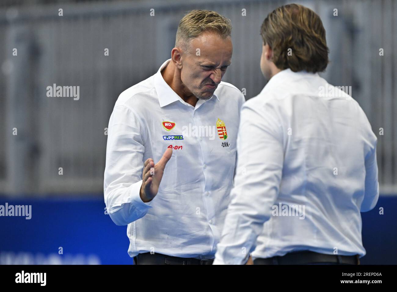 Fukuoka, Japan. 29th July, 2023. Coach of Hungary Zsolt Varga (L ...