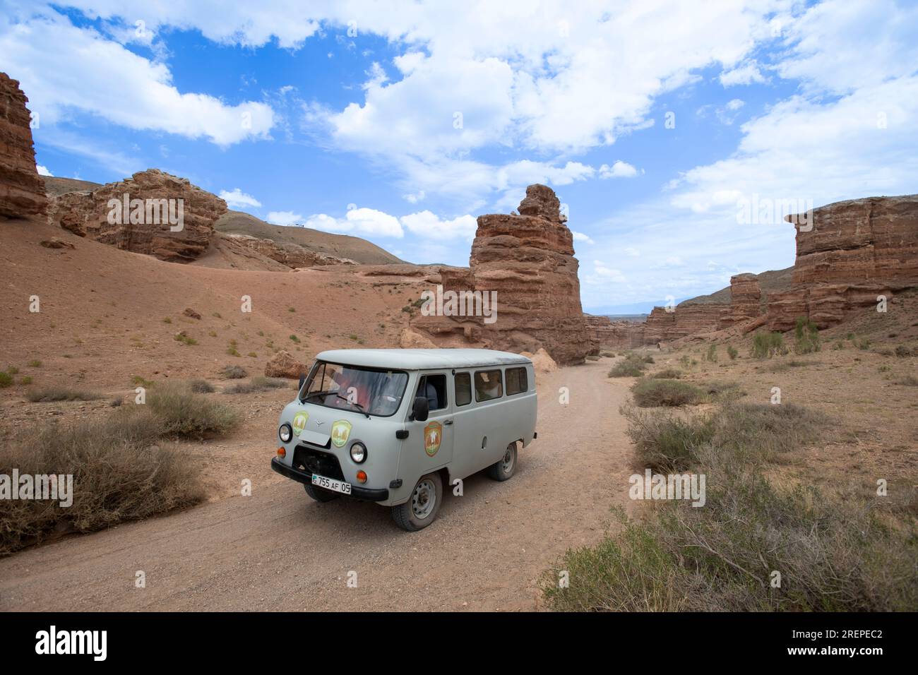 car passes by in charyn canyon, kazakhstan Stock Photo - Alamy