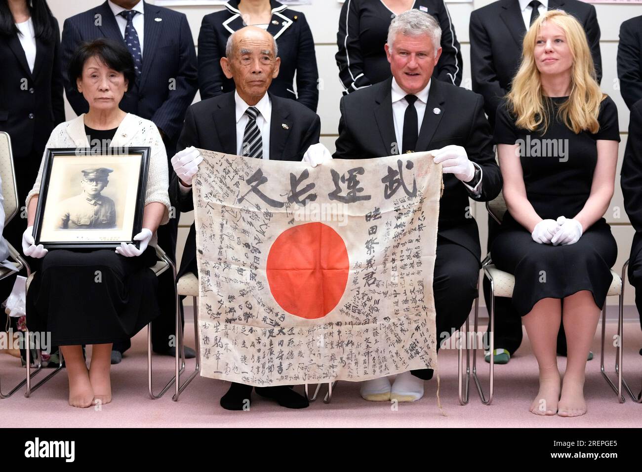 USS Lexington Museum executive director Steve Banta, center right, and ...