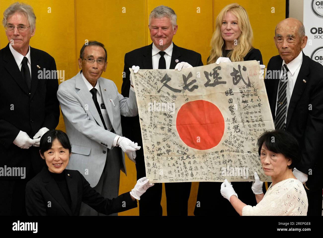 USS Lexington Museum executive director Steve Banta, center, three ...