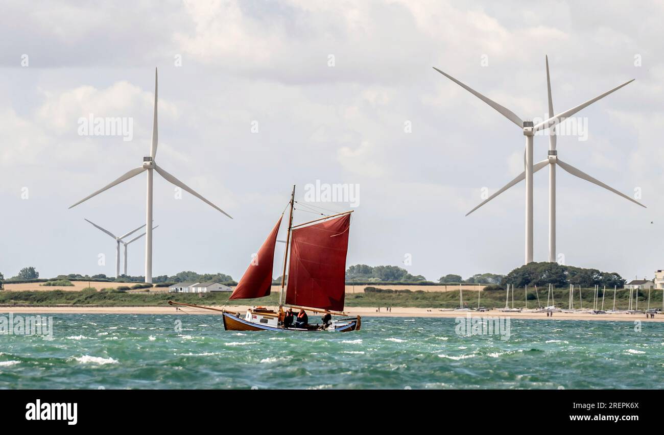 Traditional Coble fishing boats are sailed off the coast of Bridlington ...