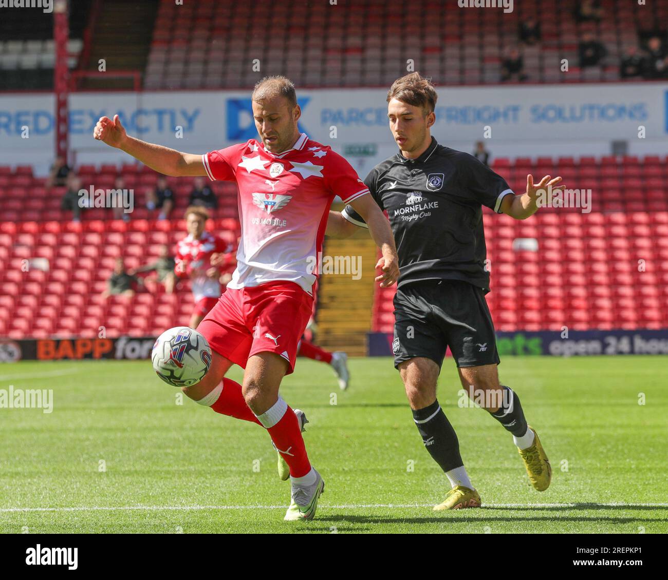 Herbie Kane #8 of Barnsley holds the ball during the Pre-season ...