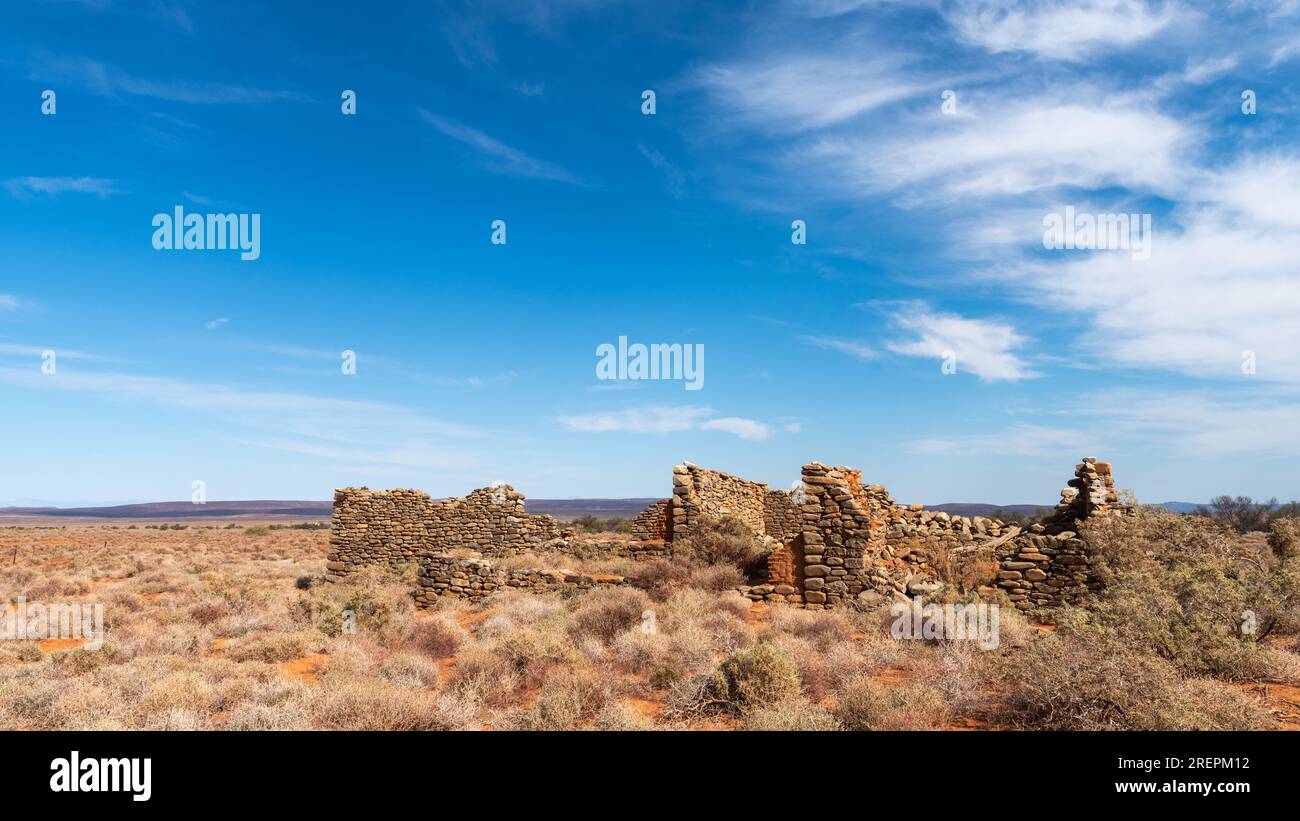 Ruins of a deserted stone house in a desert environment Stock Photo - Alamy