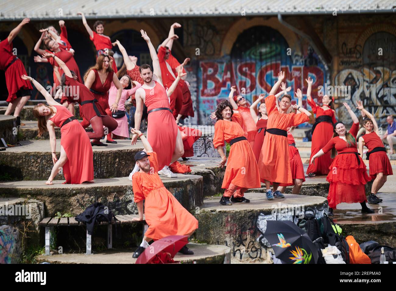Berlin, Germany. 29th July, 2023. Women and men dressed in red dance ...