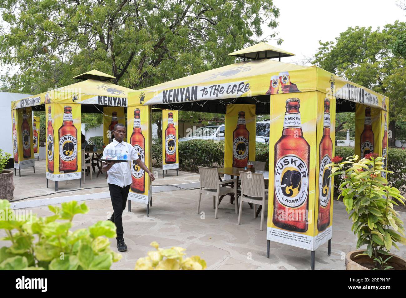 KENYA, Mombasa, beer bar with Tusker beer advertising of Diageo Group ...