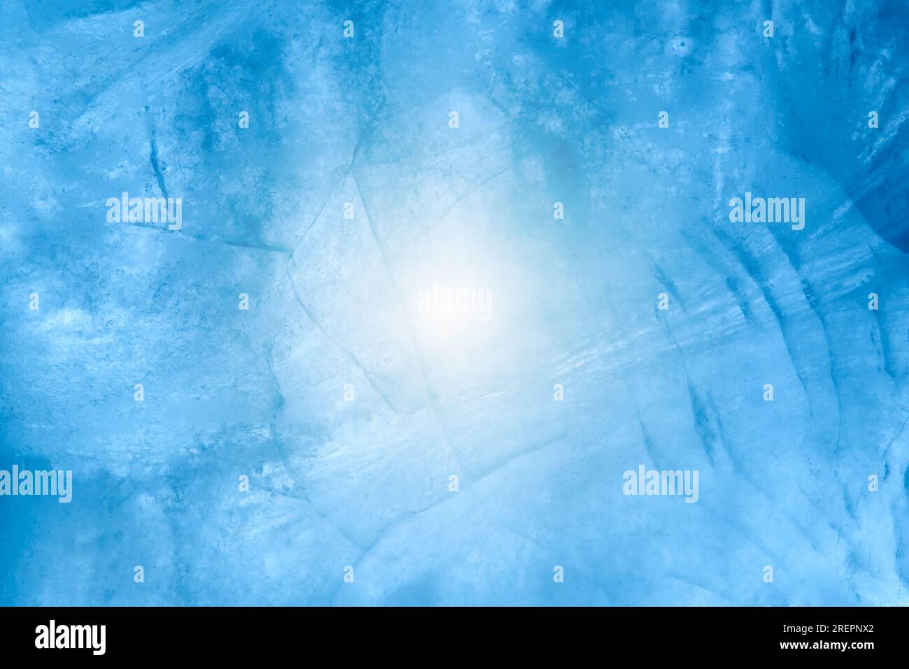 Blue ice texture with cracks, close-up, backdrop Stock Photo - Alamy