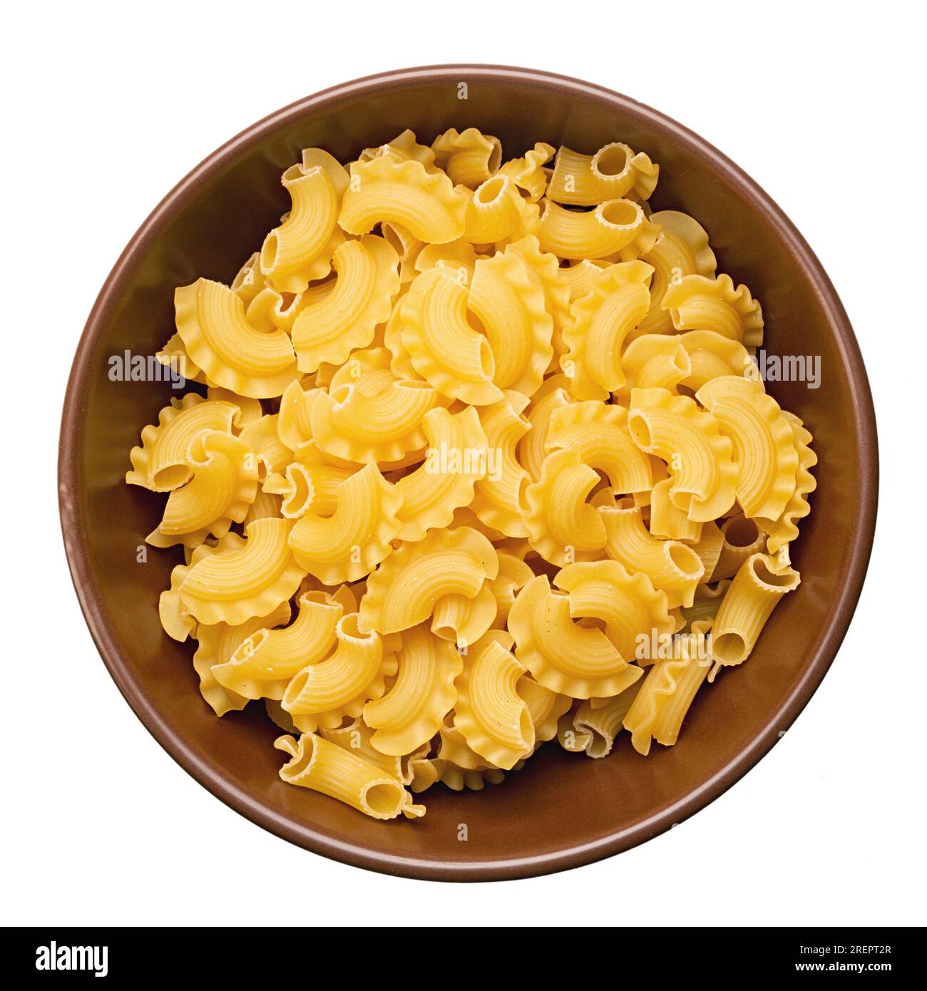 Dried macaroni cockerel scallops. Pasta in a ceramic bowl isolated on a ...